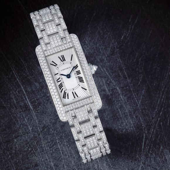 Bonhams : Cartier. A lady's fine 18K white gold and diamond set ...