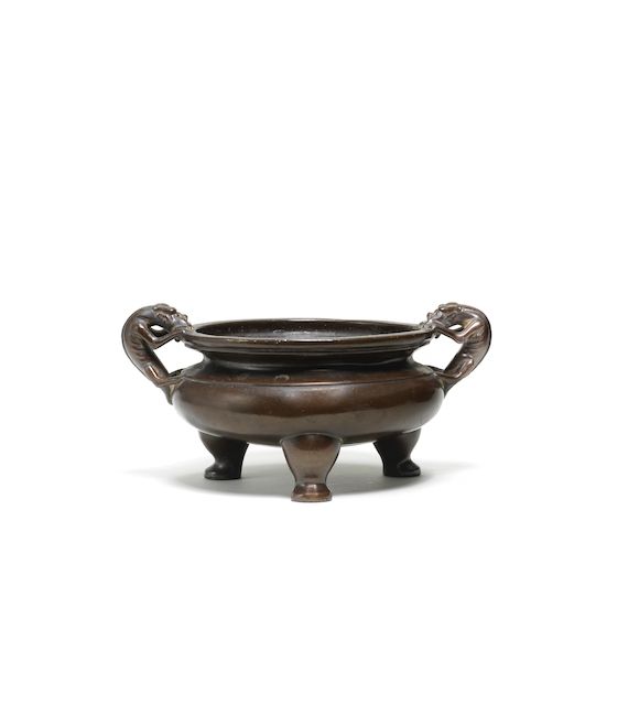 Bonhams : A bronze tripod 'chilong' incense burner Qianlong six ...
