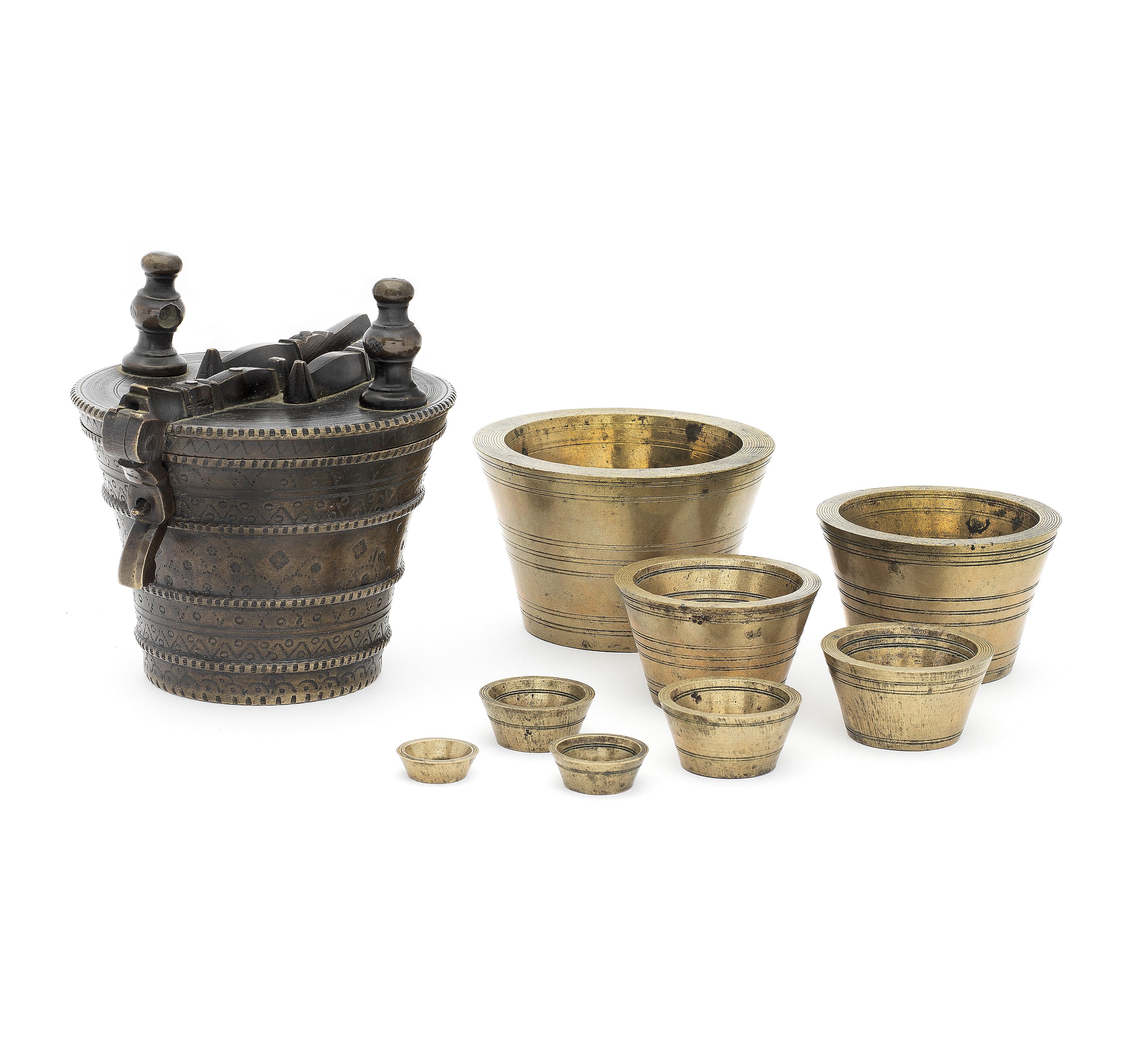Bonhams : A large set of 17th century leaded bronze nested cup weights ...