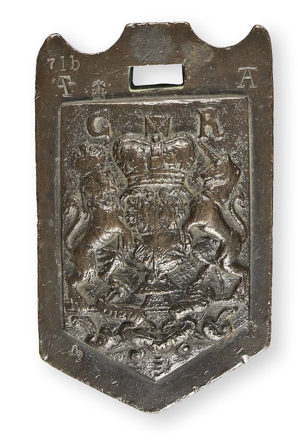 Bonhams : A George I leaded bronze 7lb wool weight, circa 1715