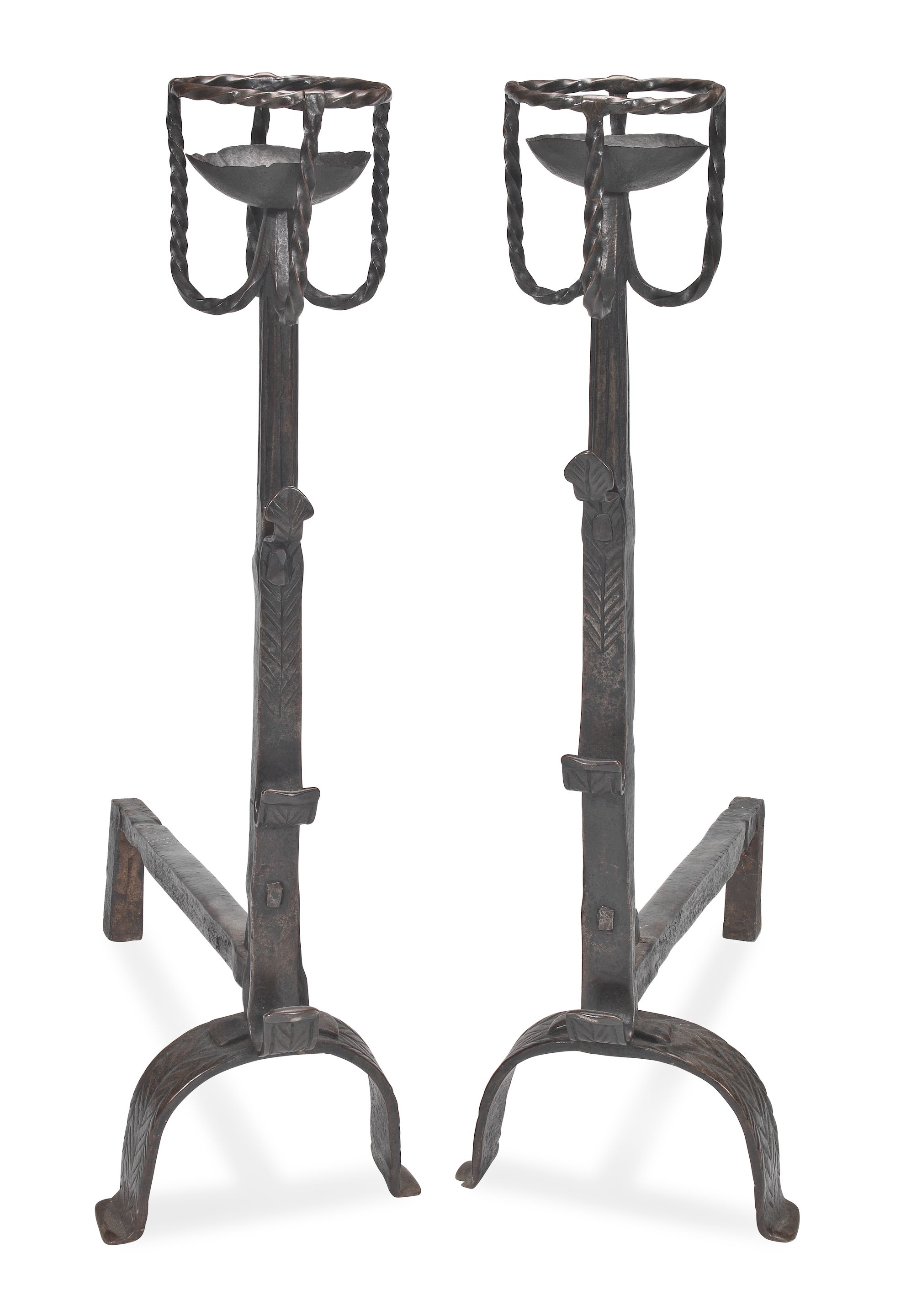 Bonhams : A pair of wrought iron cresset-topped spit dogs, in the 16th ...