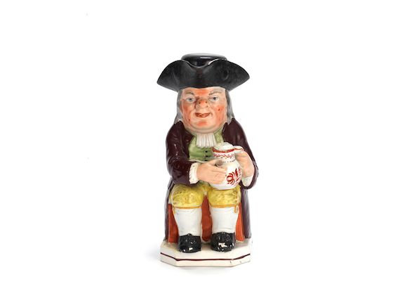Bonhams : A Staffordshire Toby jug and cover, circa 1820, and a later Toby