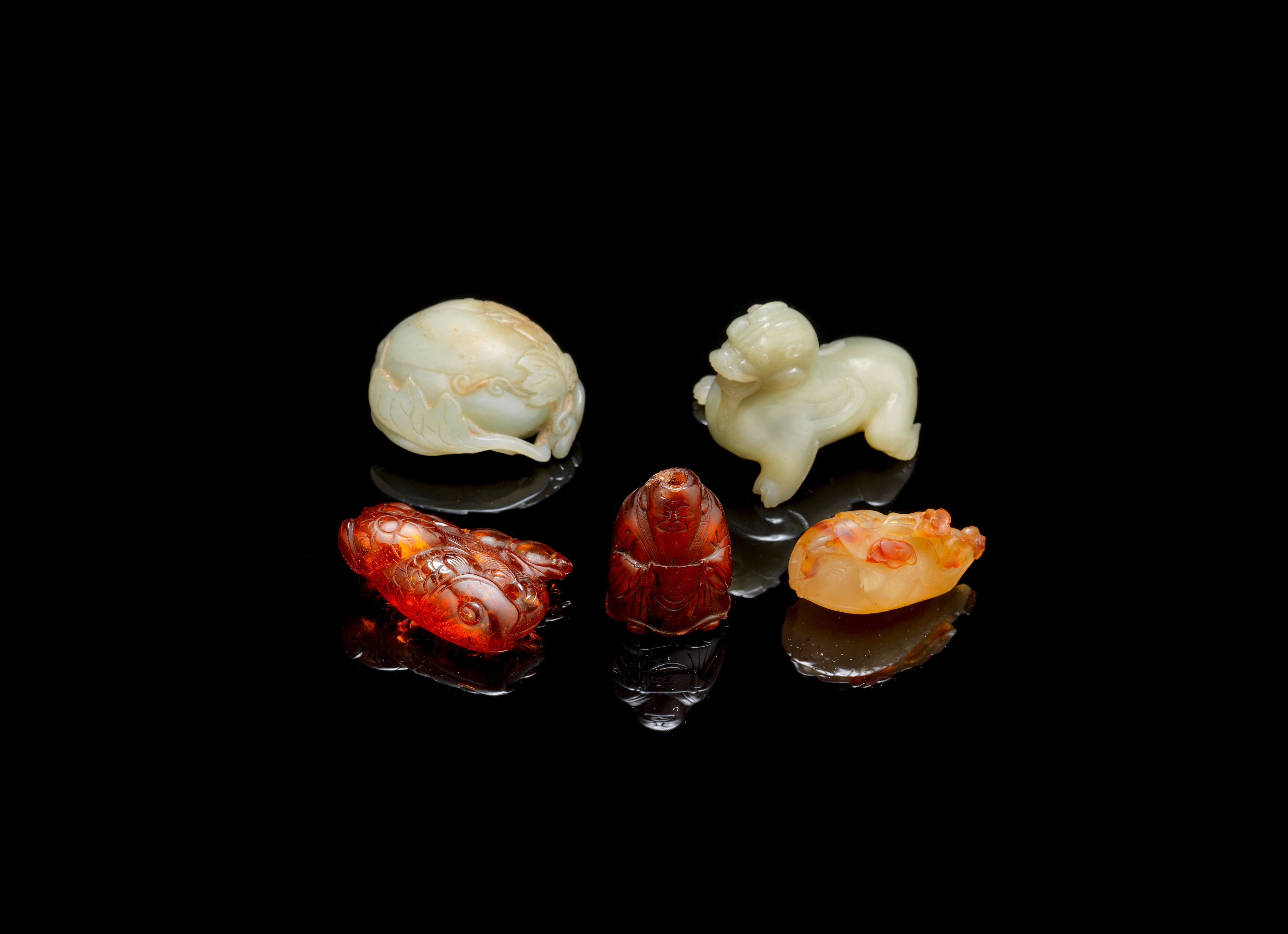 Bonhams : A group of green jade, agate and amber carvings Late Ming ...
