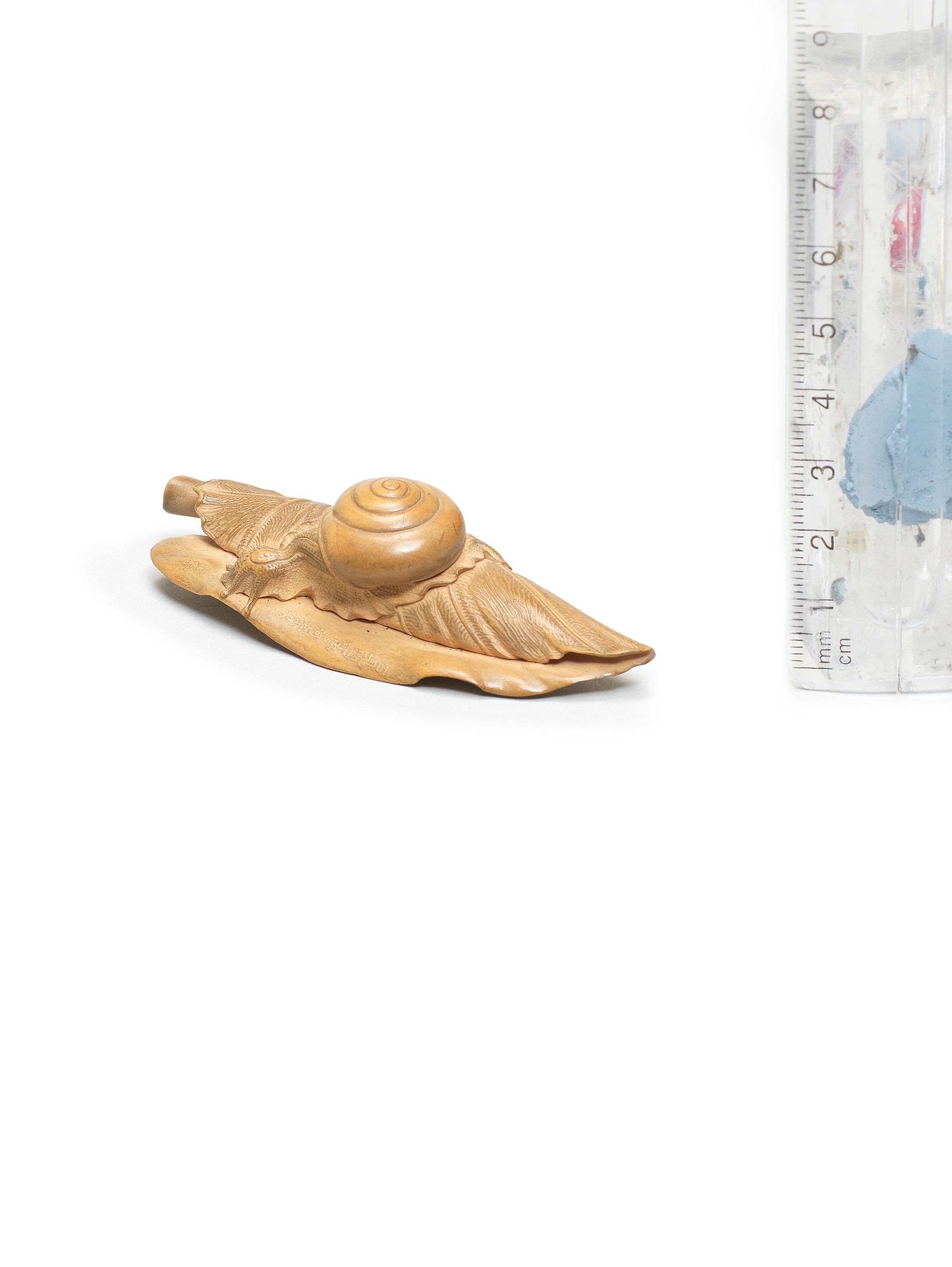 Bonhams : A boxwood netsuke of a snail on a taro leaf By Seiyodo ...
