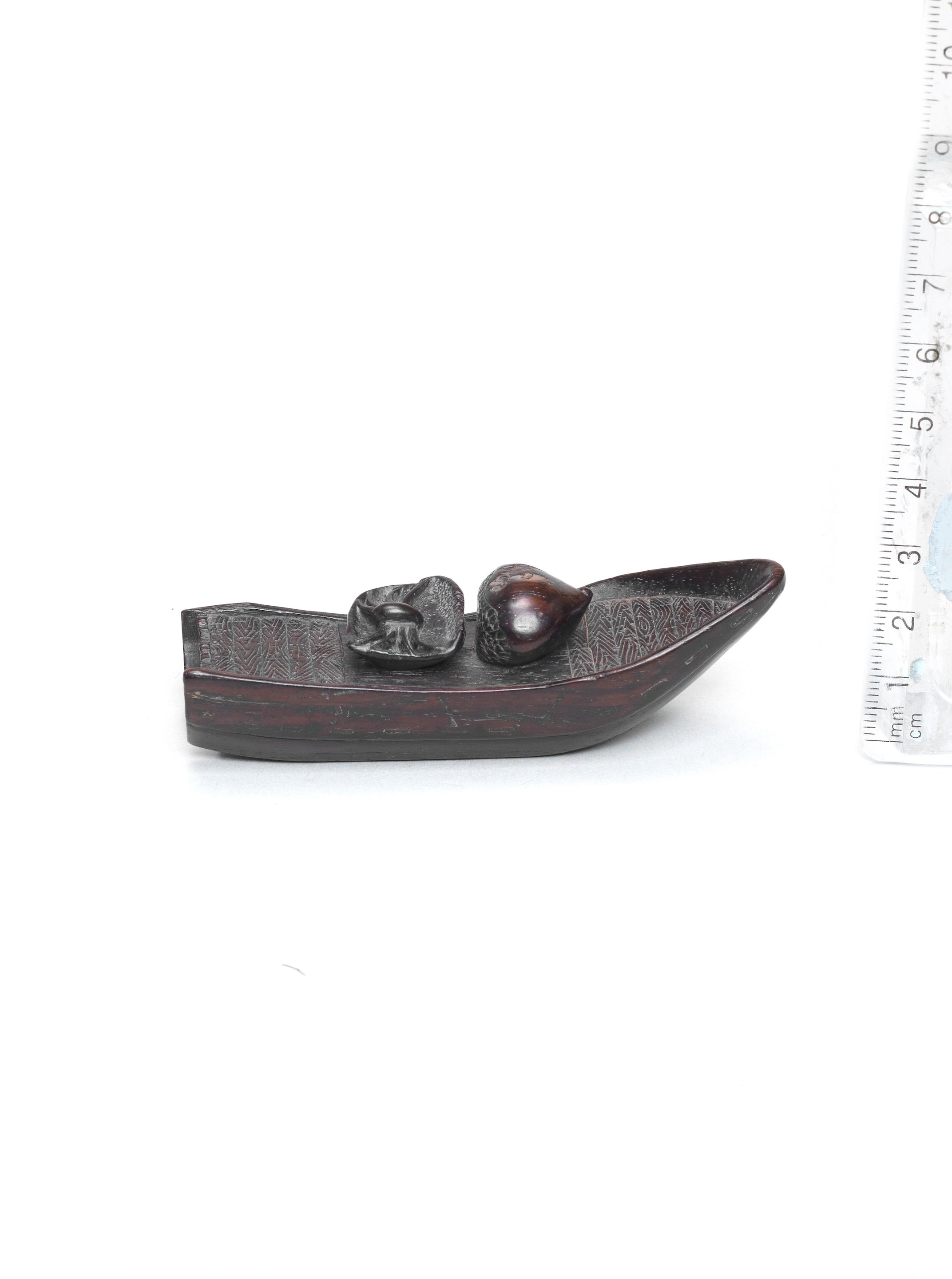 Bonhams : A kurogaki (black persimmon) wood netsuke of a spider and ...