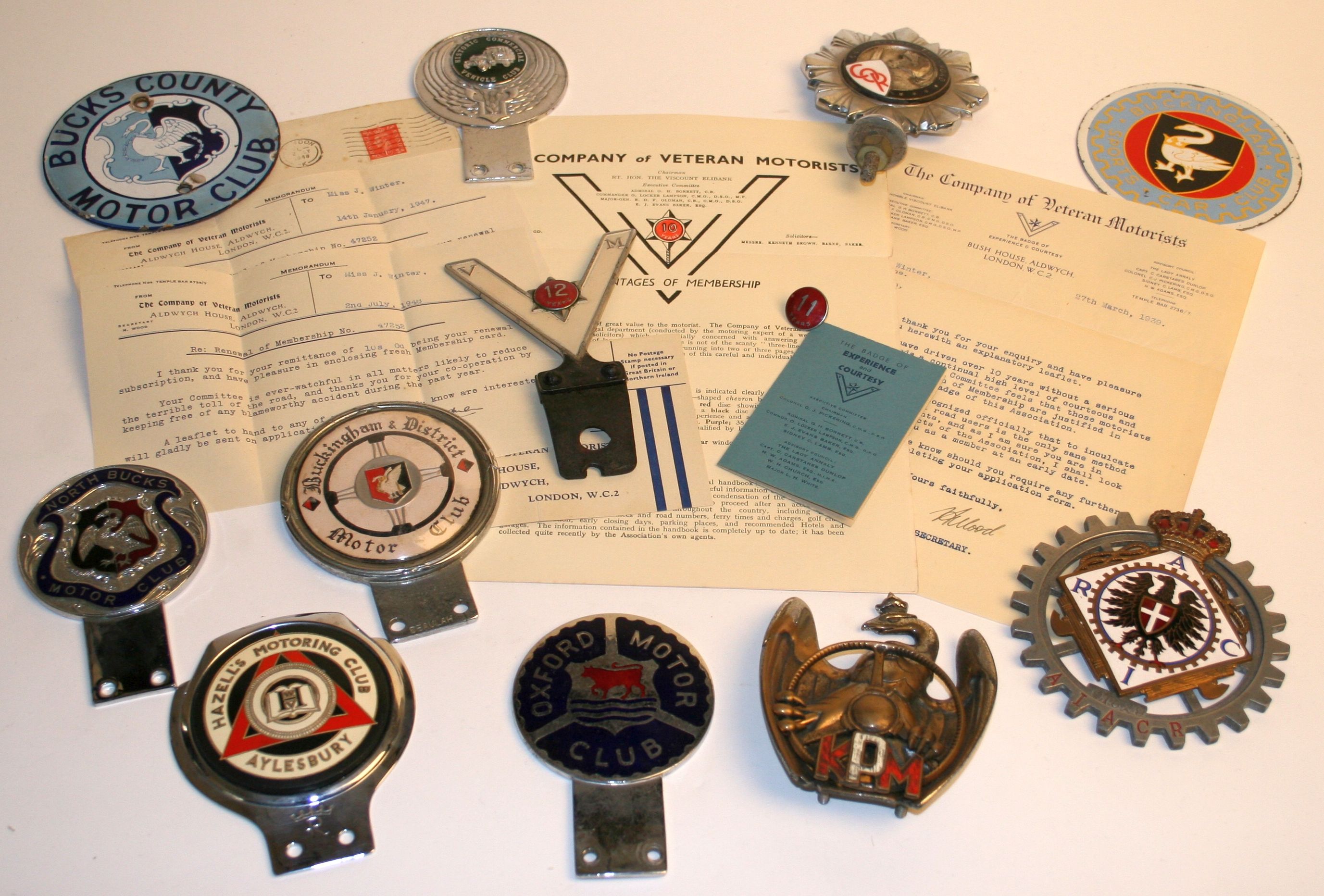 Bonhams Cars : Eleven car badges, ((Qty))