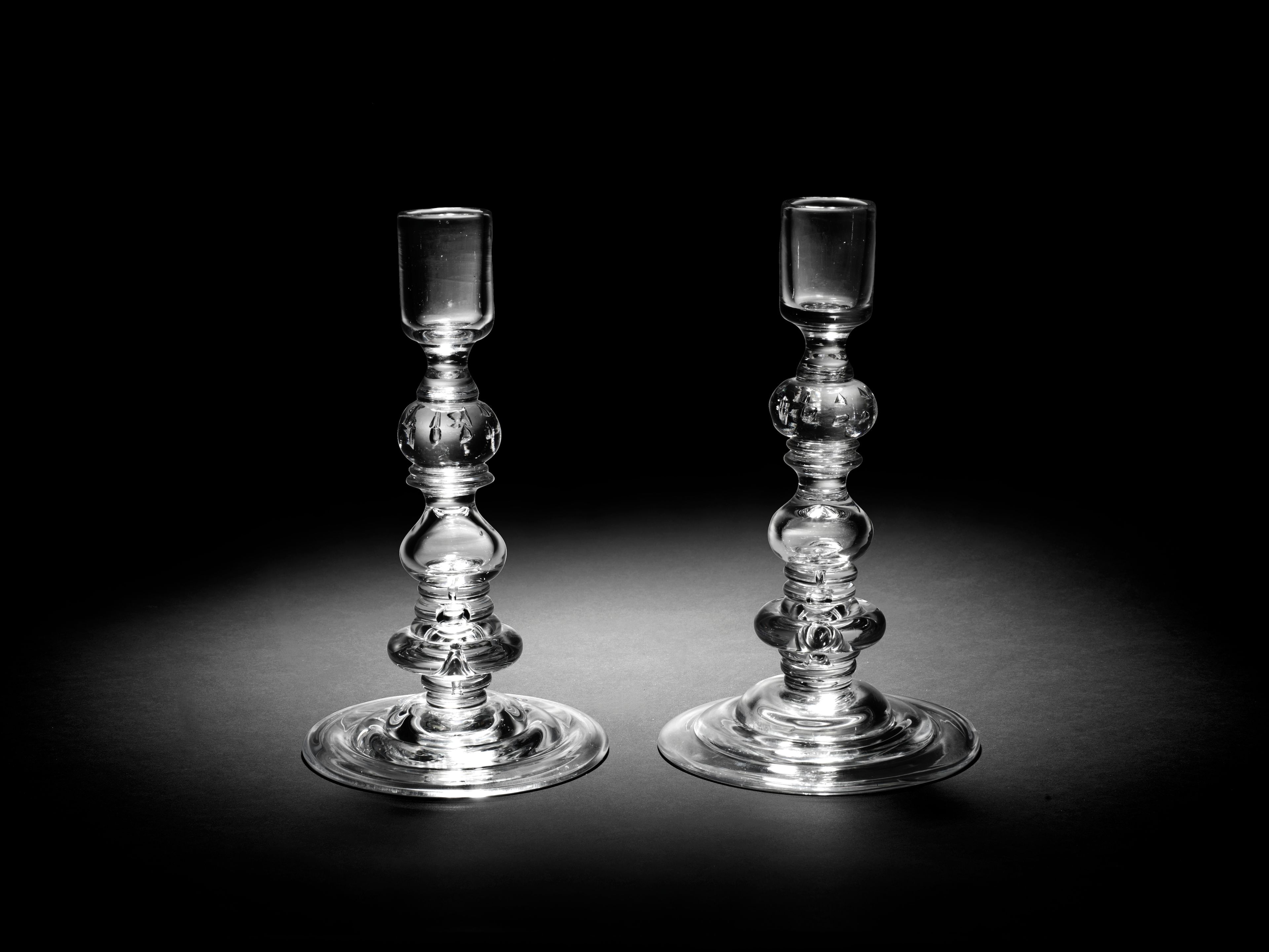 Bonhams : An interesting pair of heavy baluster candlesticks, 20th century