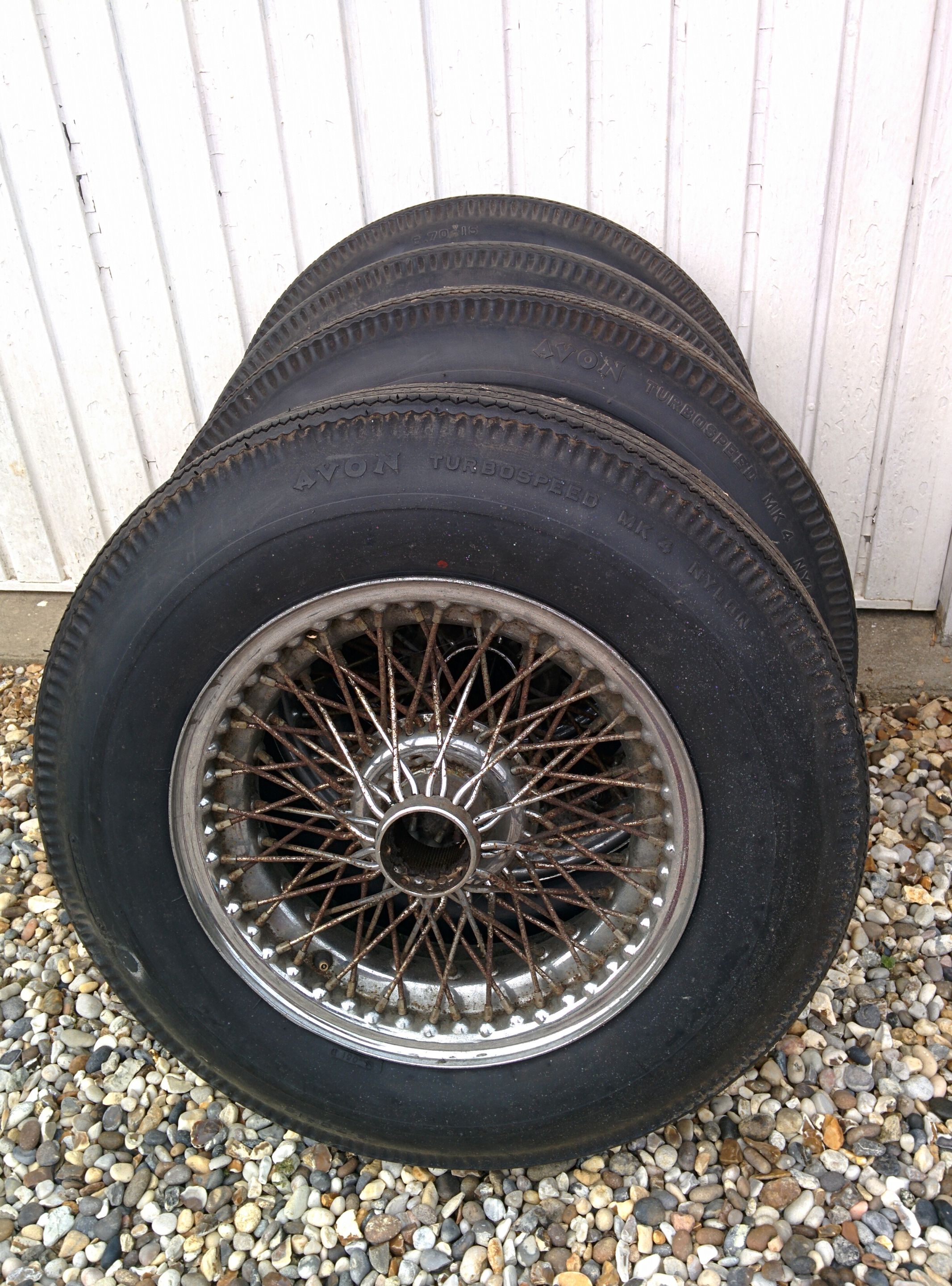 Bonhams Cars : Four wire wheels with tyres for an Aston Martin DB6, ((4))