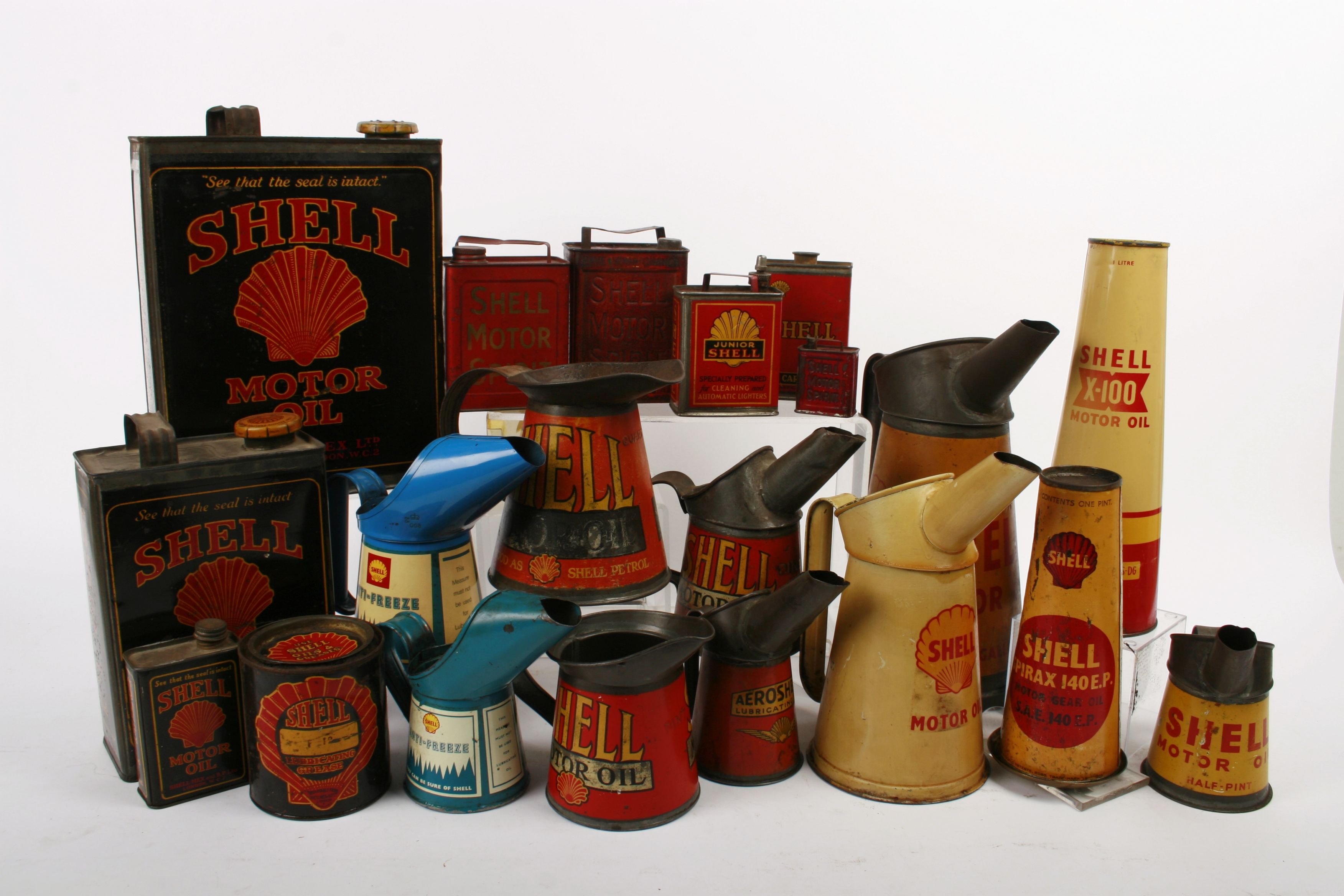 Bonhams Cars : Assorted Shell oil cans, tins and pourers, ((20))