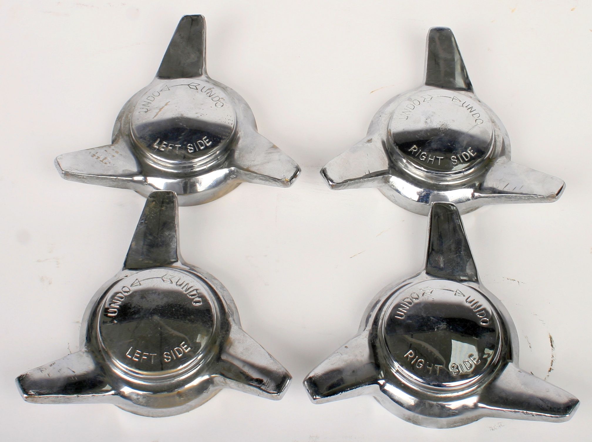 Bonhams Cars : A set of four Aston Martin DB4 wheel spinners, ((Qty))