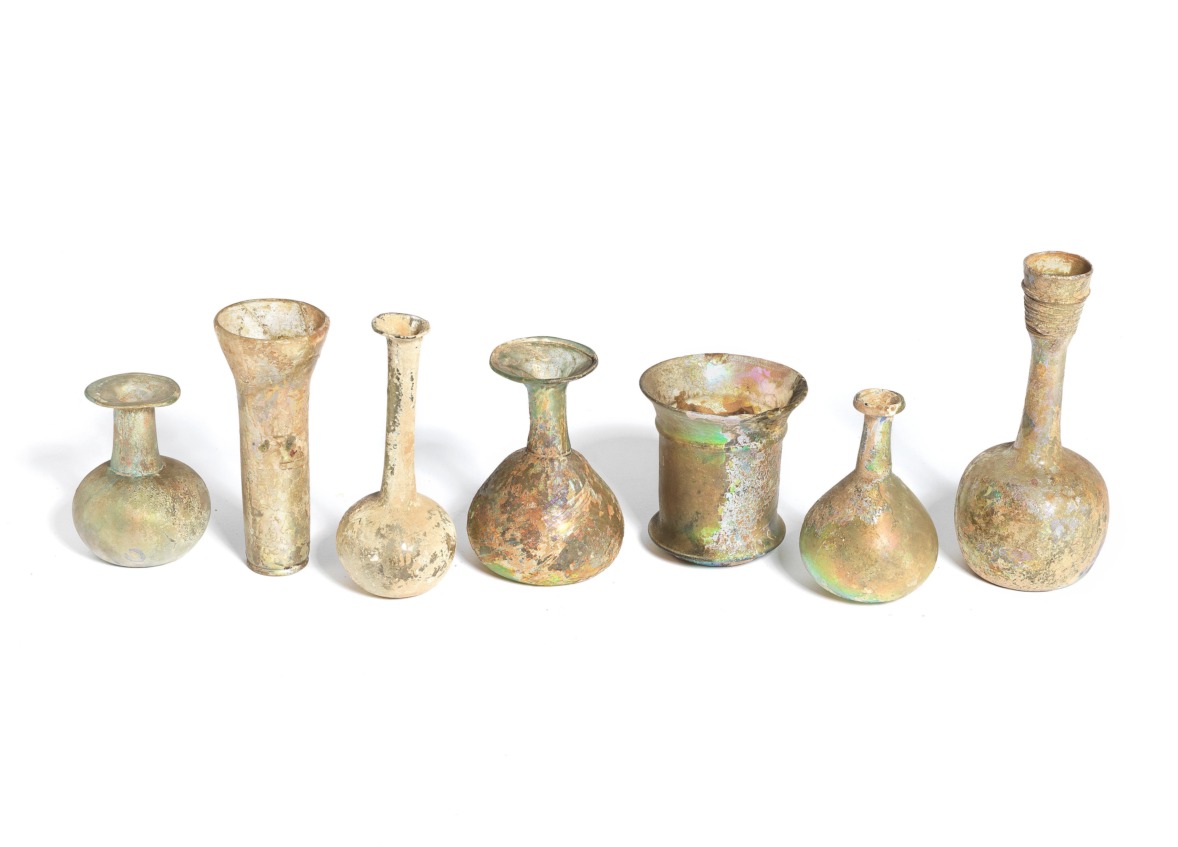 Bonhams A Group Of Six Roman Green Glass Vessels And An Islamic Glass
