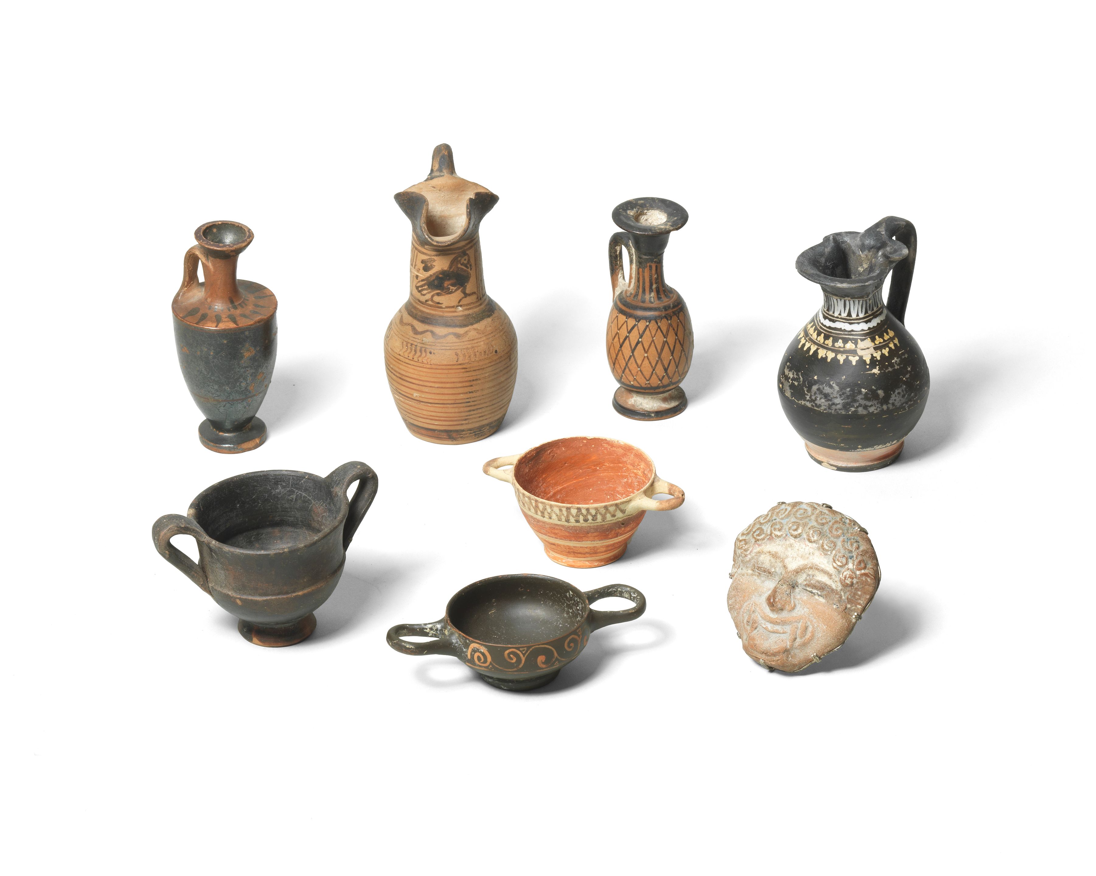 Bonhams : Seven miniature Greek pottery vessels and a Campanian ...
