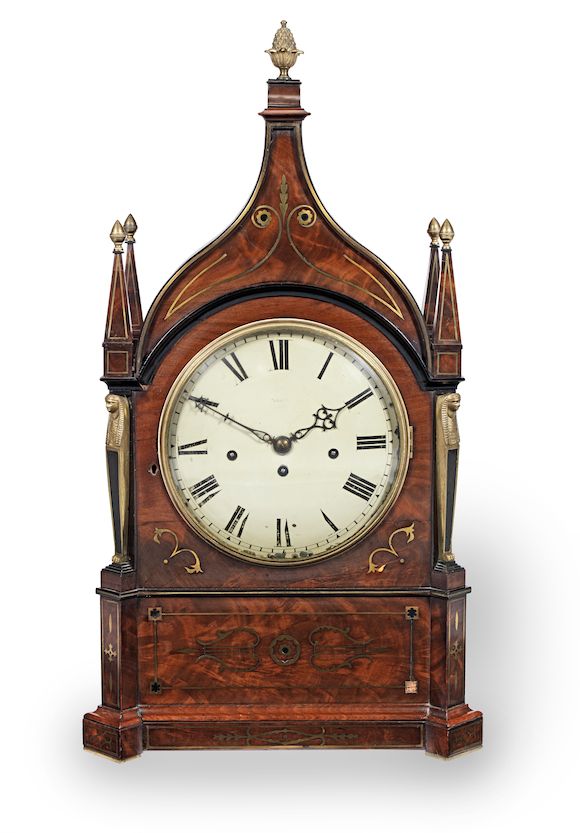 Bonhams : An early 19th century mahogany and brass inlaid triple fusee ...