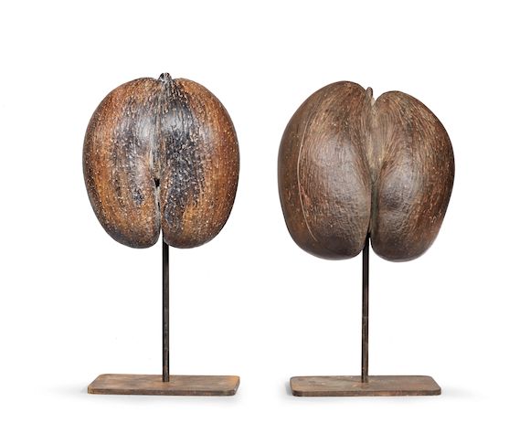 Bonhams : A pair of coco de mer nuts (Lodoicea maldivica) on wrought ...