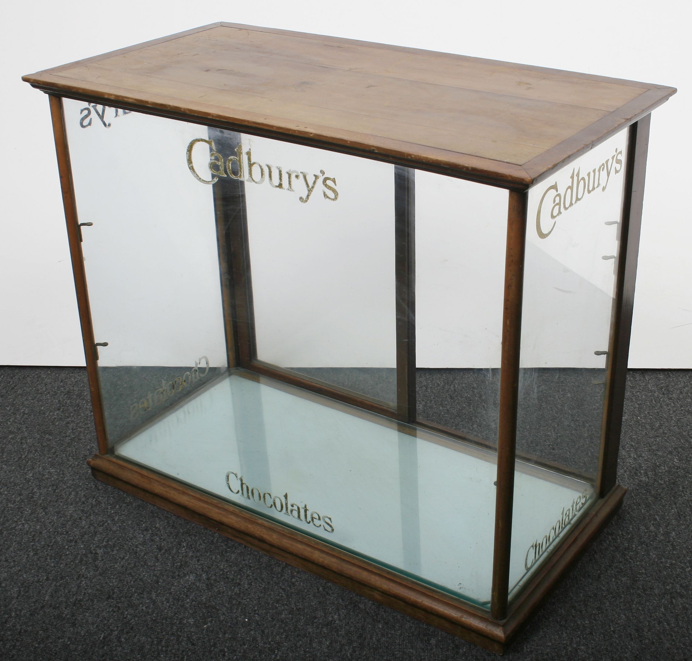 Bonhams Cars : A 'Cadbury's Chocolates' glazed shop display cabinet, ((2))