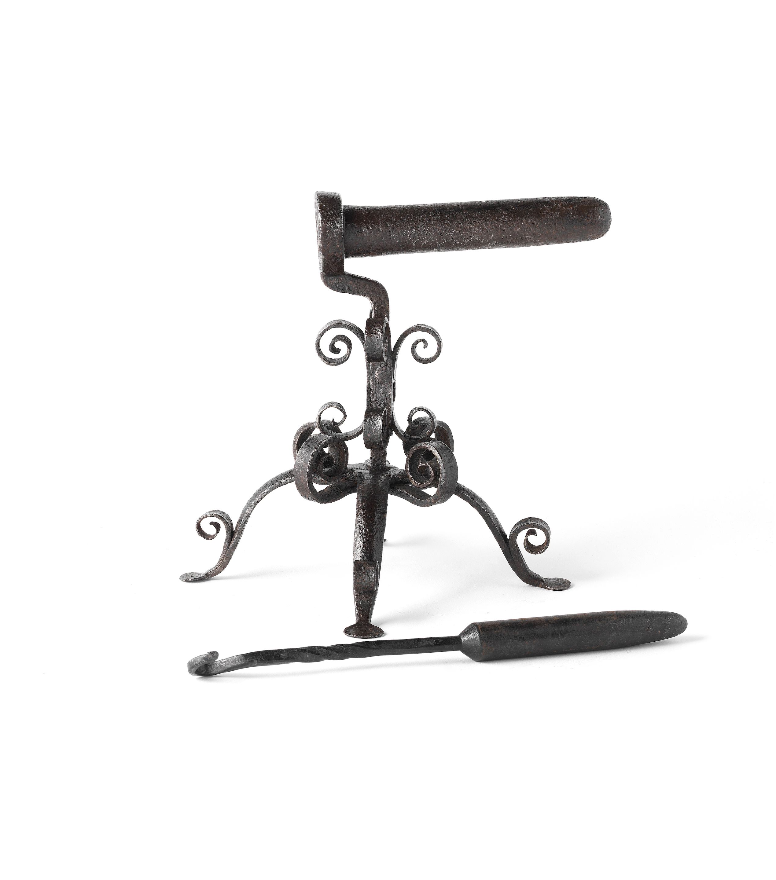 Bonhams : A rare and fine wrought iron goffering iron, with poker ...