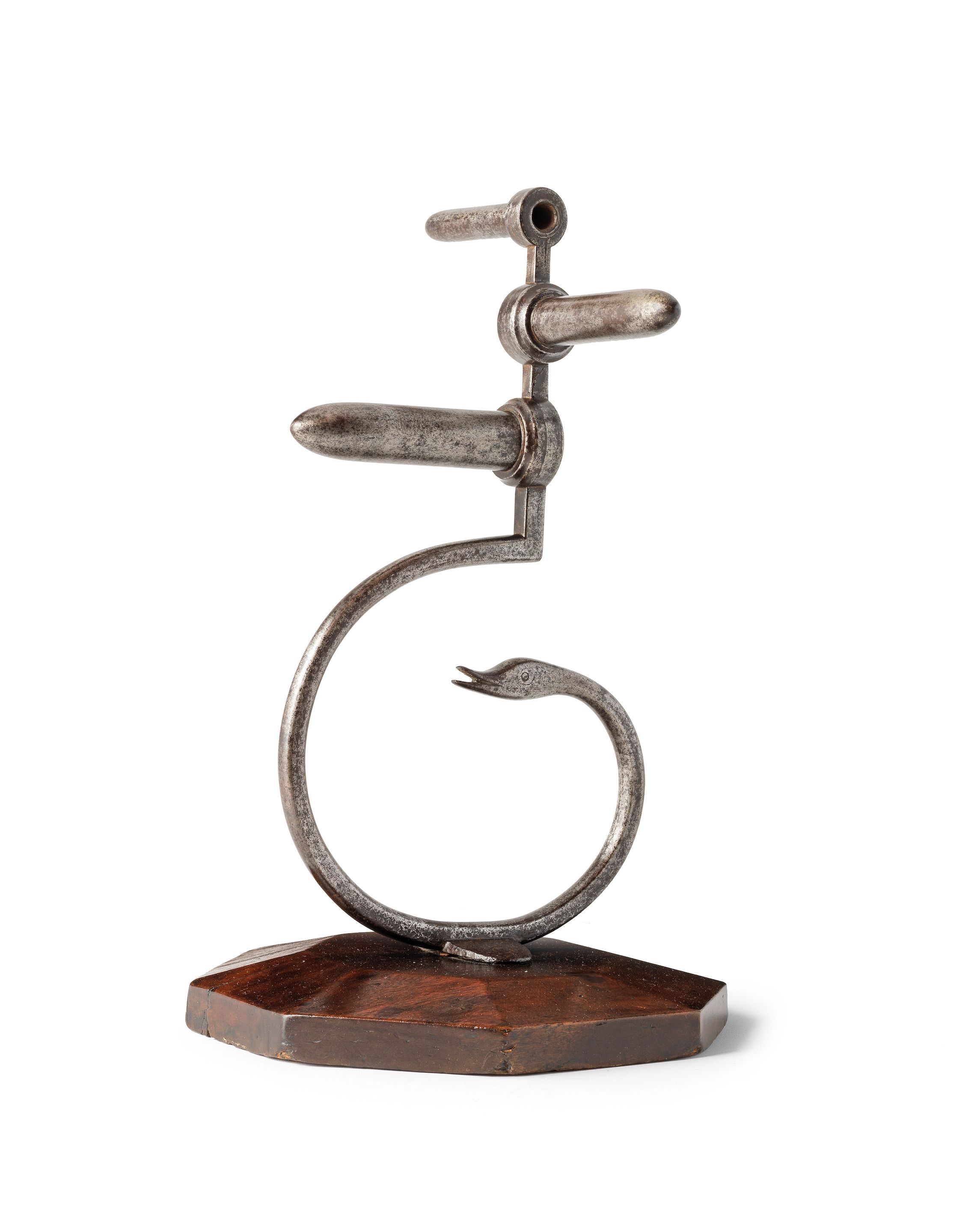A rare wrought iron triple-barrelled goffering iron, on a fruitwood ...