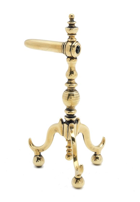Bonhams : A small cast brass goffering iron, British, circa 1820