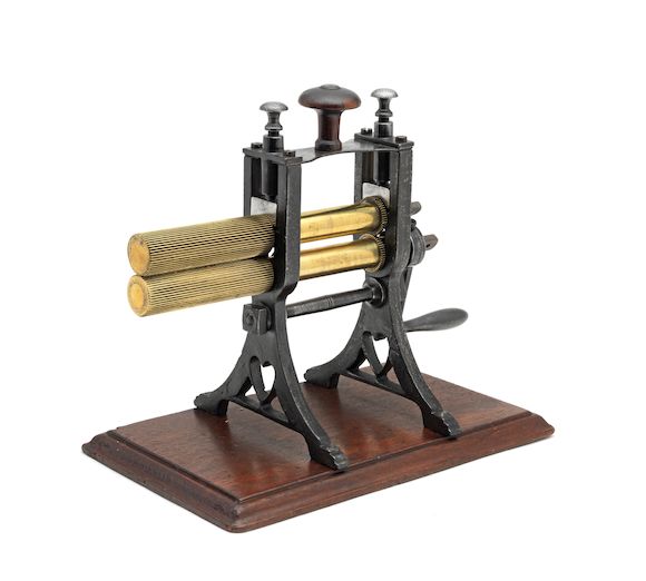 Bonhams : A brass and iron crimping machine, English, circa 1850-80 (3)