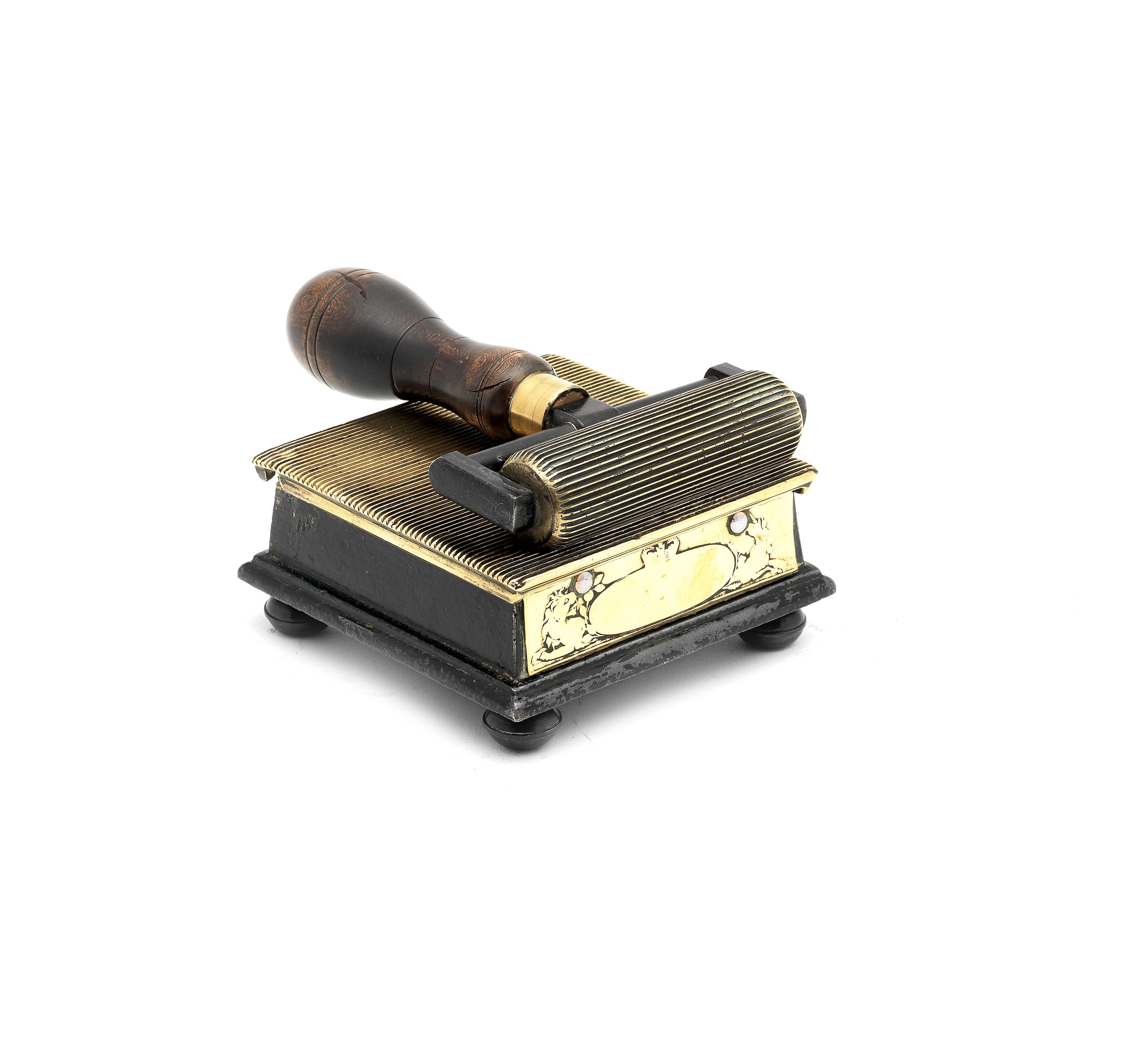 Bonhams : A rare brass and iron crimping box with roller, English ...