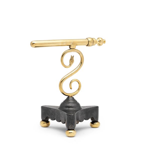 Bonhams : A brass and cast iron goffering iron, British, circa 1820 (2)