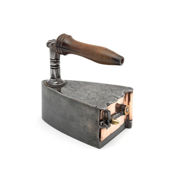 Bonhams : A wrought iron and copper box iron, Belgian, circa 1850-80 (2)