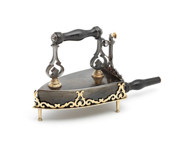 Bonhams : A steel and brass box iron on stand, Belgian, circa 1890-1900 (2)