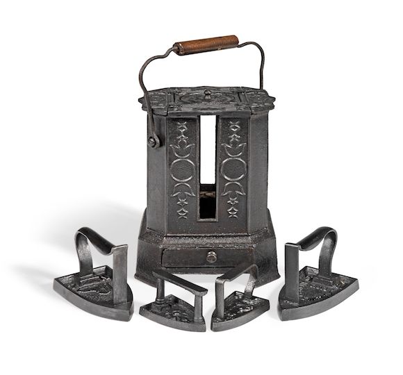 Bonhams : A cast iron portable garret stove for irons, French, circa ...