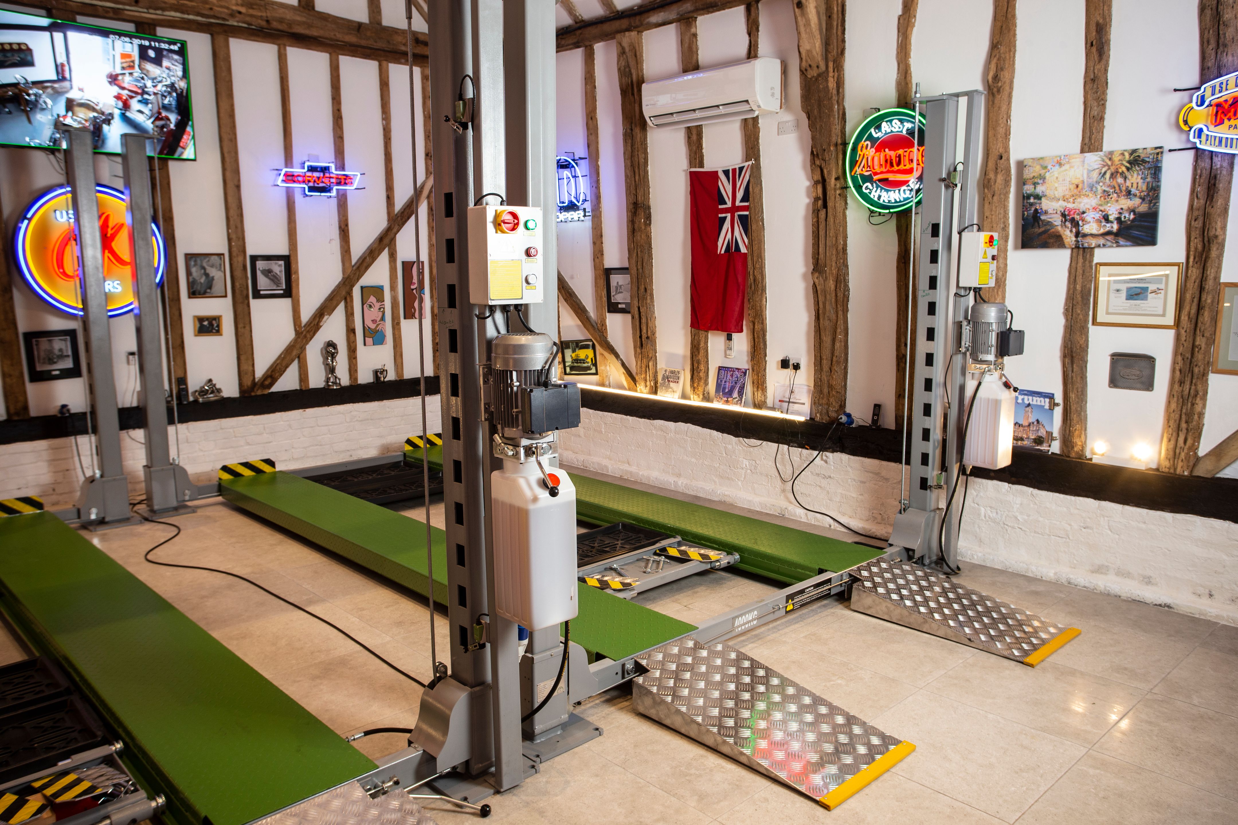 Bonhams Cars : A free-standing 'Alness' four post car lift by Strongman ...