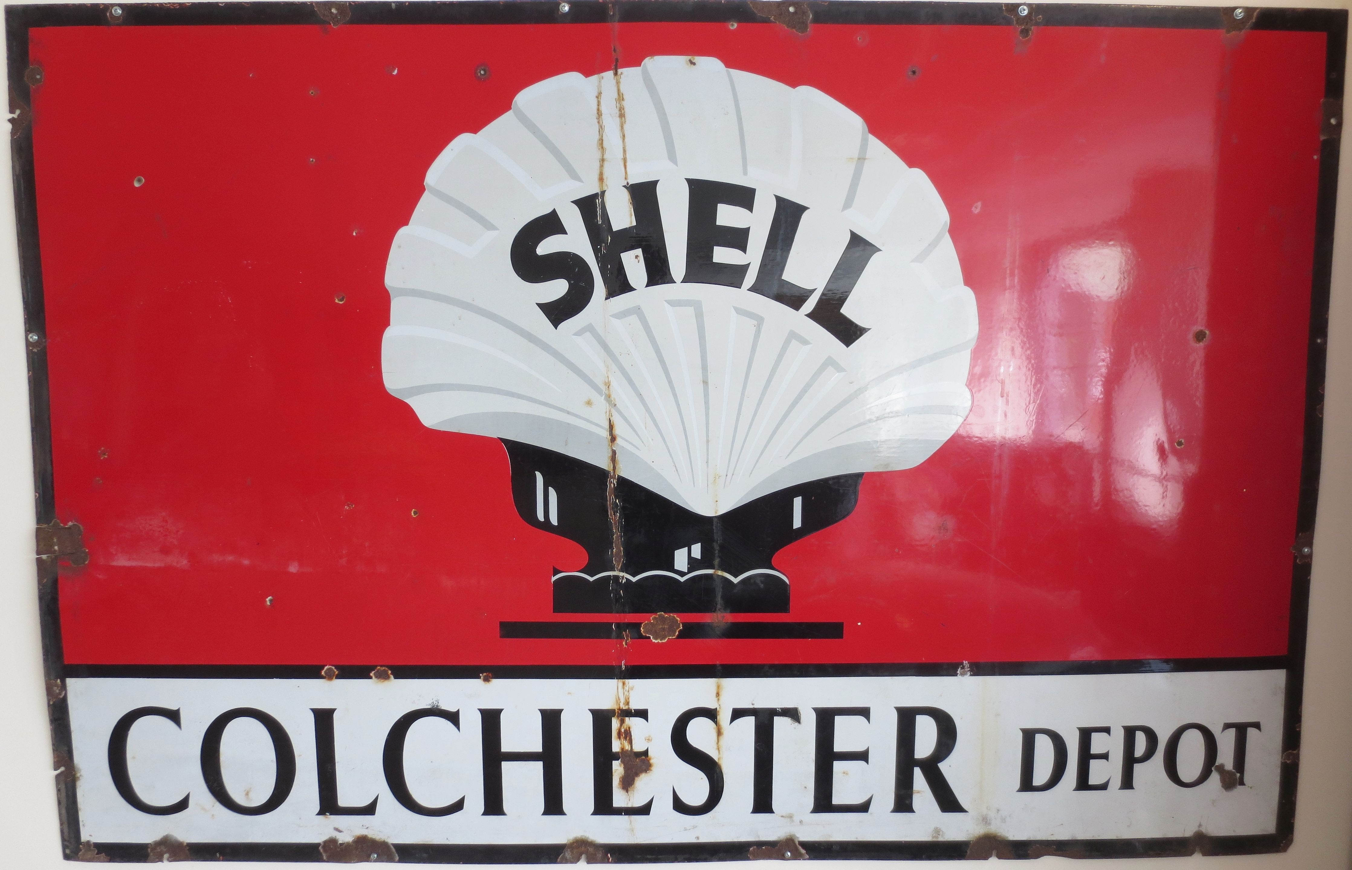 Bonhams Cars : A large Shell Colchester Depot enamel sign,
