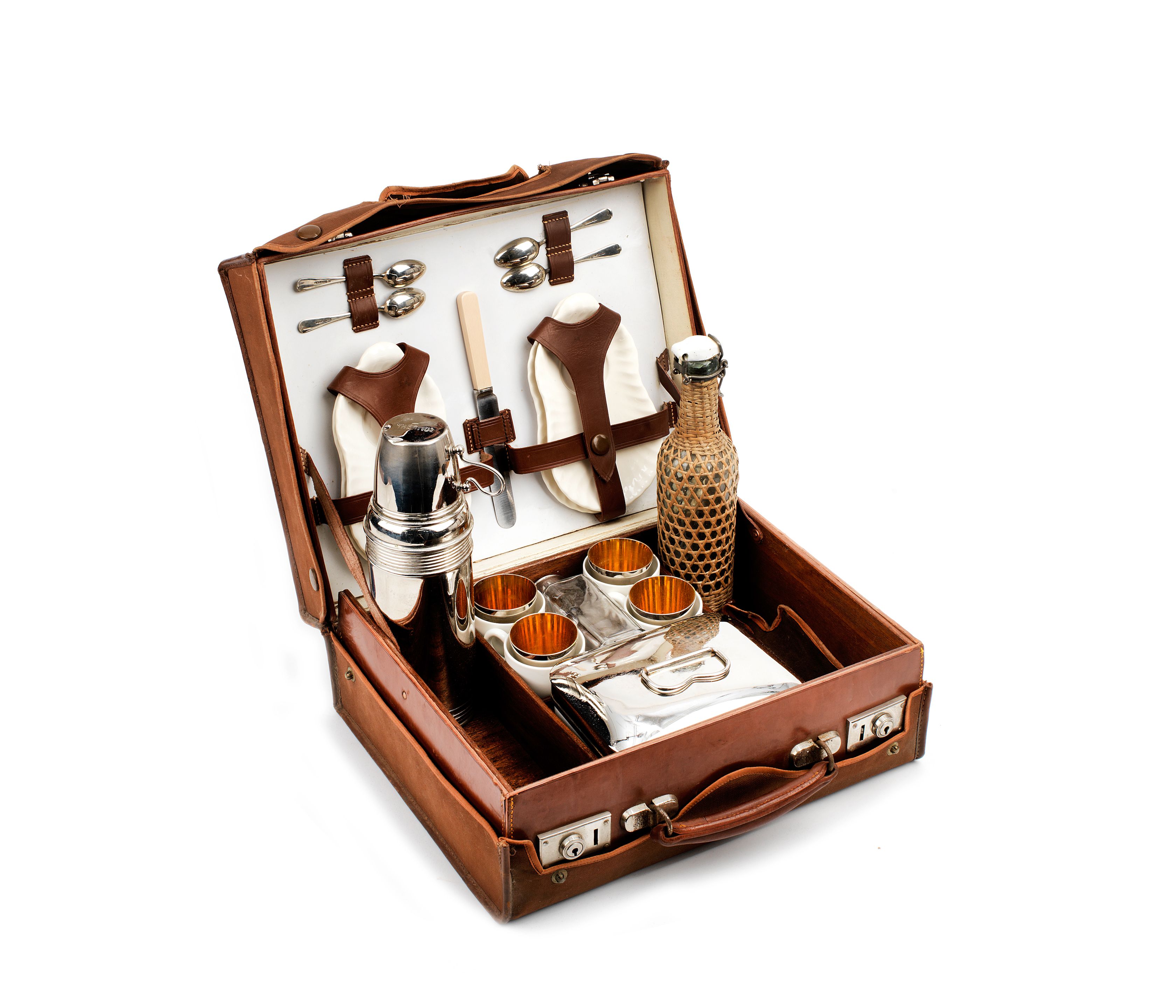 Bonhams Cars : A leather-cased picnic/drinks set for four persons, 1920s,
