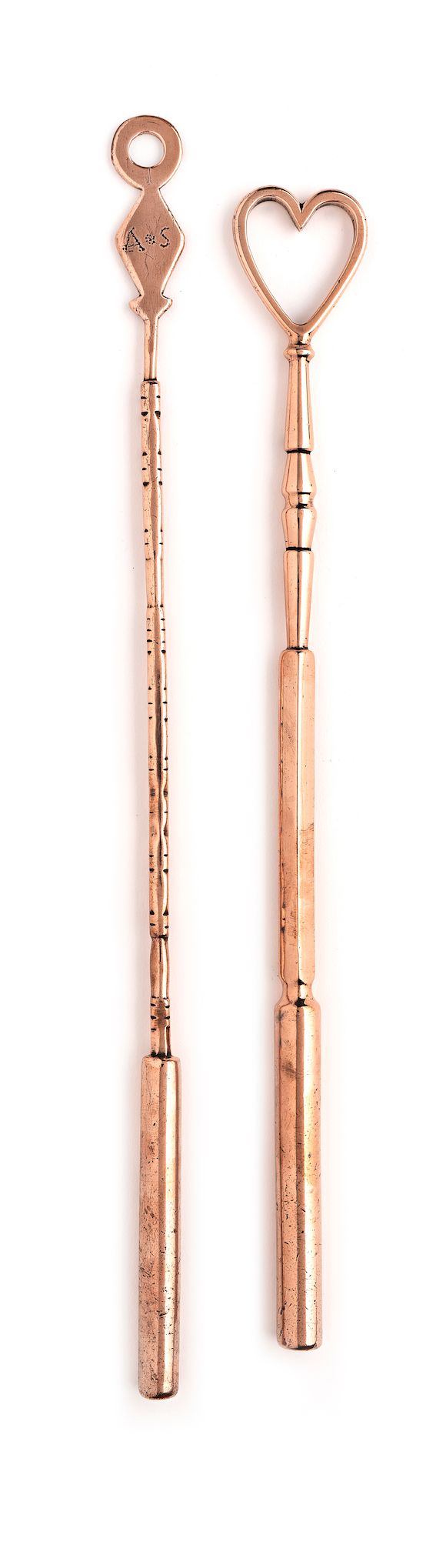 Bonhams : Two wrought copper poking sticks, British (2)