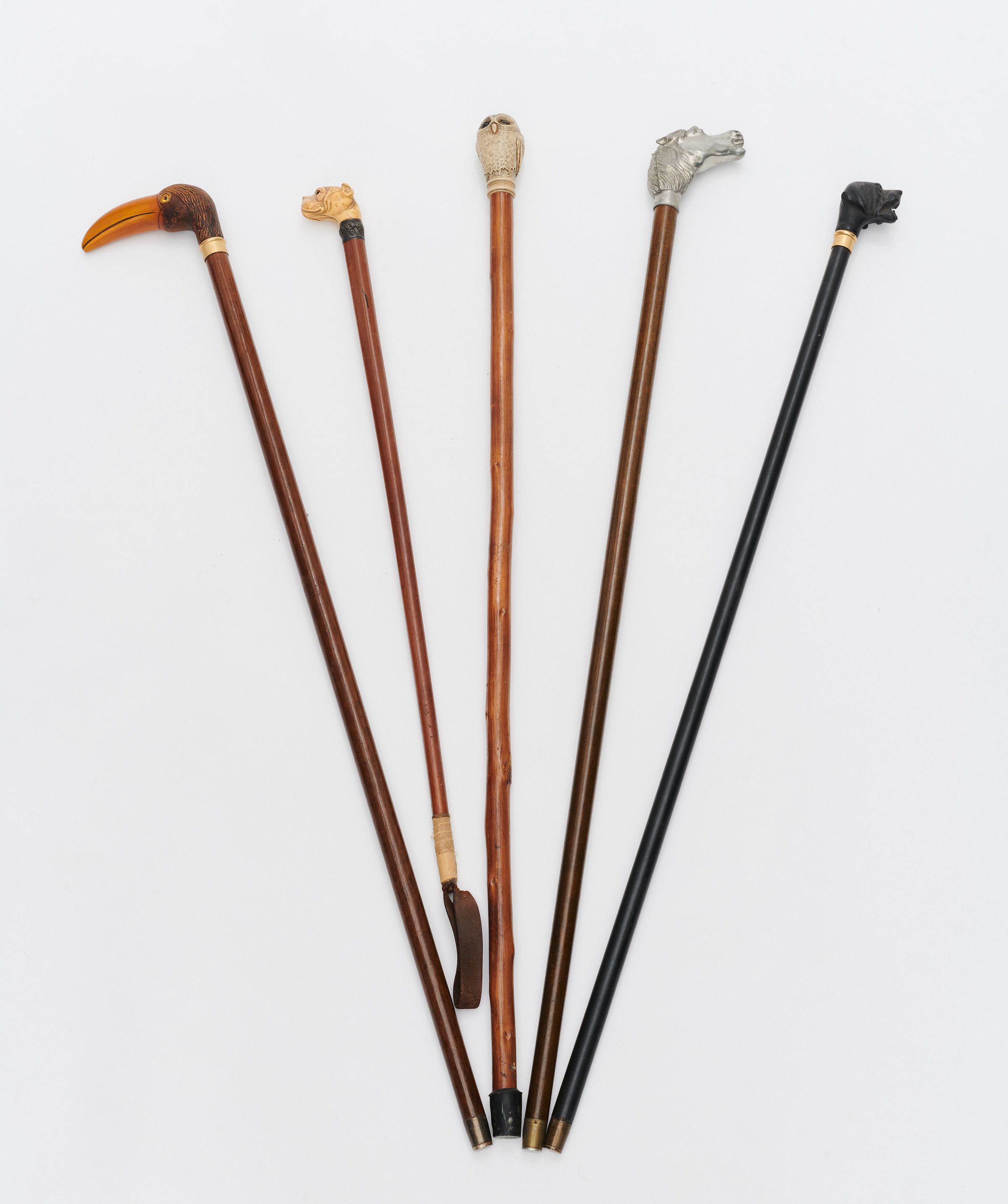 Bonhams : AN ASSEMBLED GROUP OF WALKING CANES AND A WHIP The whip ...