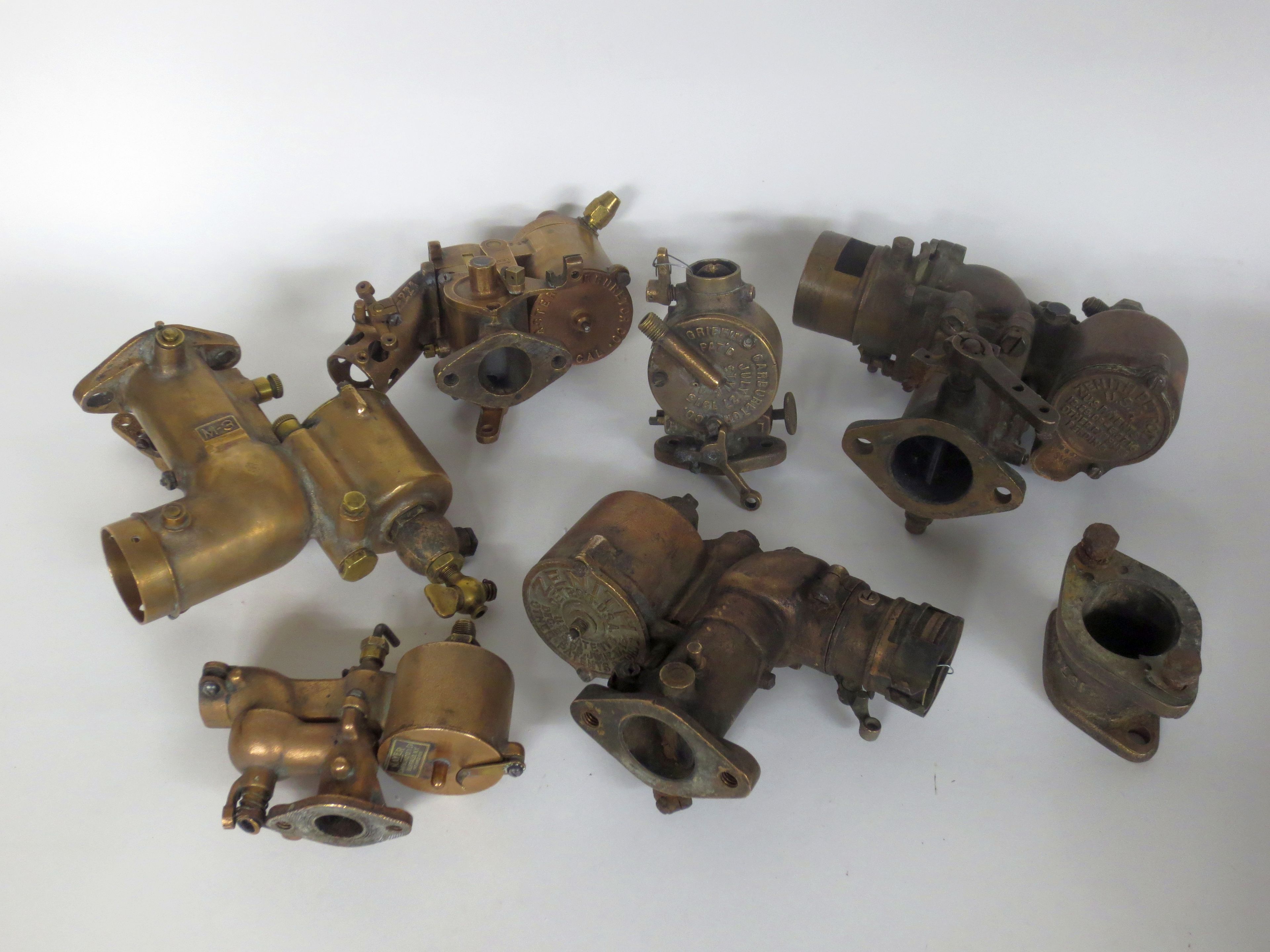 Bonhams Cars : Six early American bronze carburettors, ((7))
