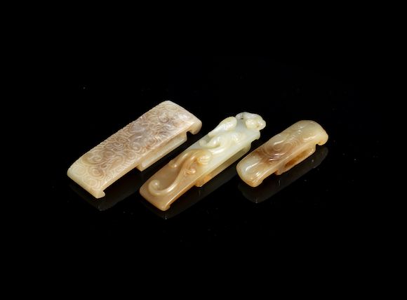 Bonhams : A group of three jade sword slides Ming Dynasty (3)