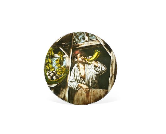 Bonhams : An enamelled stained glass roundel of a horn player possibly ...
