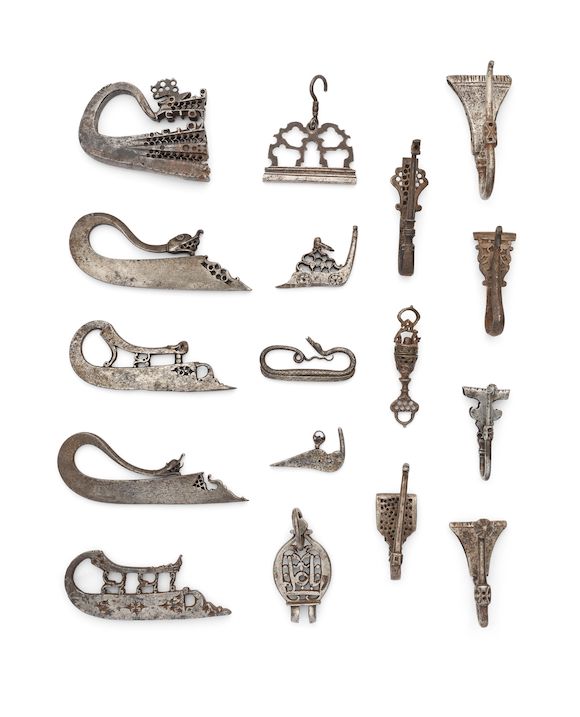 Bonhams : A collection of steel flint-strikers and belt hooks Persia ...