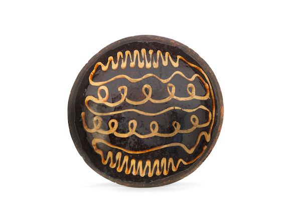 Bonhams : A very large slipware dish, 18th century