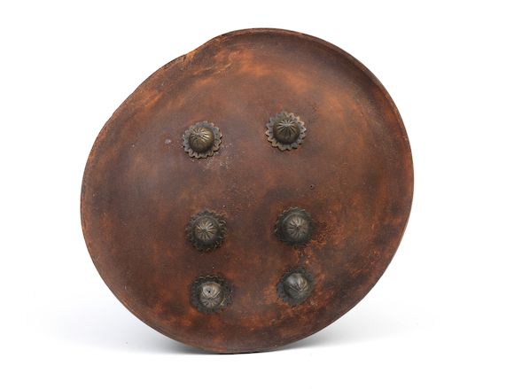 Bonhams : A hide shield inscribed with the name of a Sikh, Paan Singh ...
