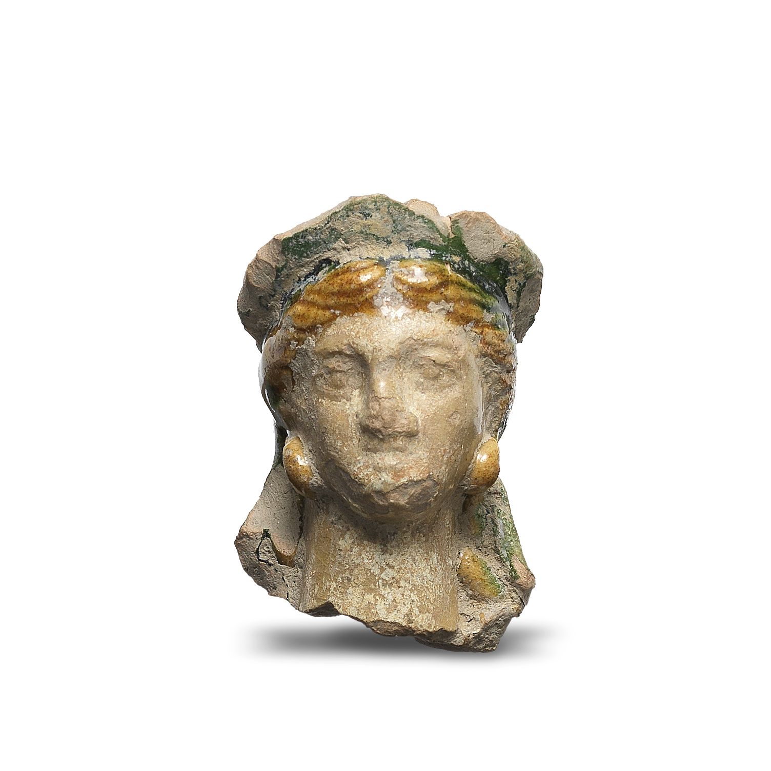 Bonhams : A Roman lead-glazed terracotta head of a goddess