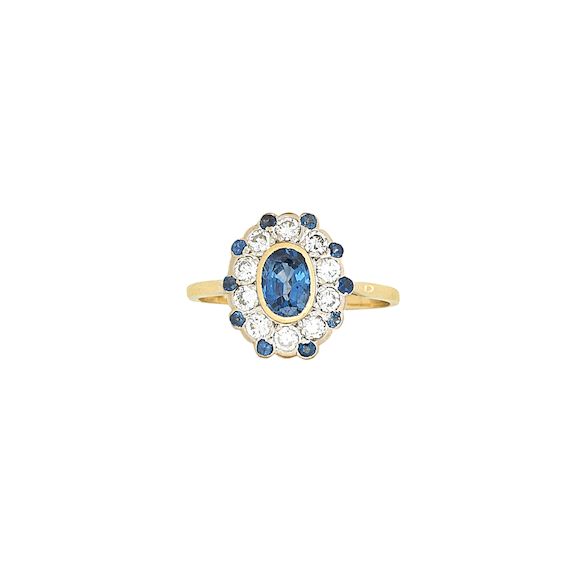 Bonhams : A sapphire and diamond cluster ring, retailed by Joseph Bonnar