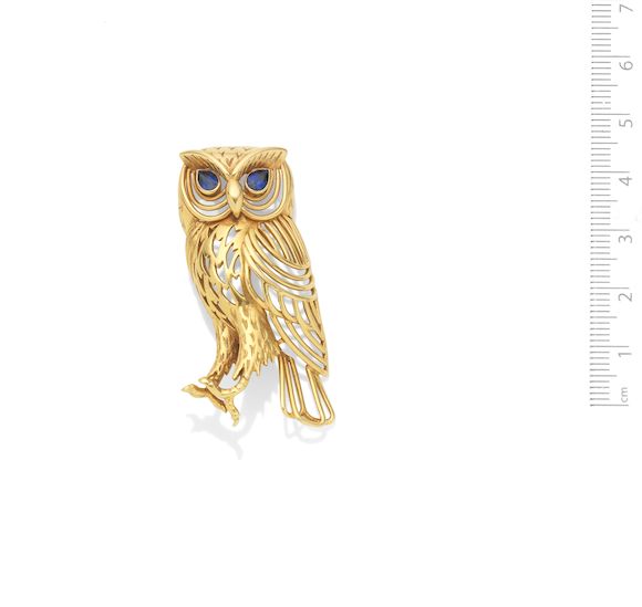 Bonhams : A sapphire and gold owl brooch, by Cartier,