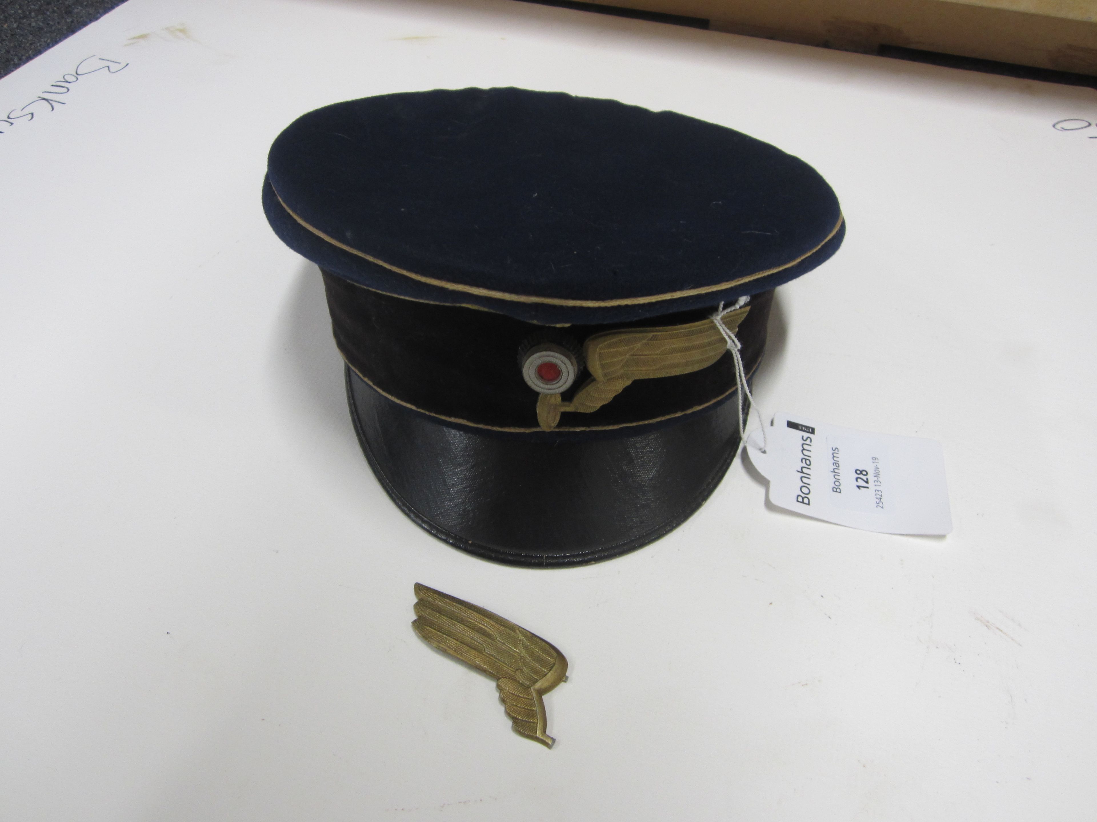 Bonhams : A German WW2 Railway Cap,