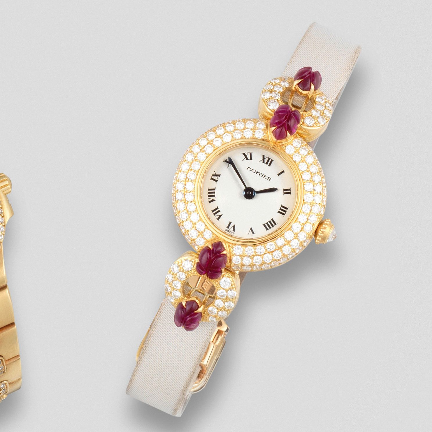 Bonhams : Cartier. A fine lady's 18K gold, carved ruby and diamond set ...