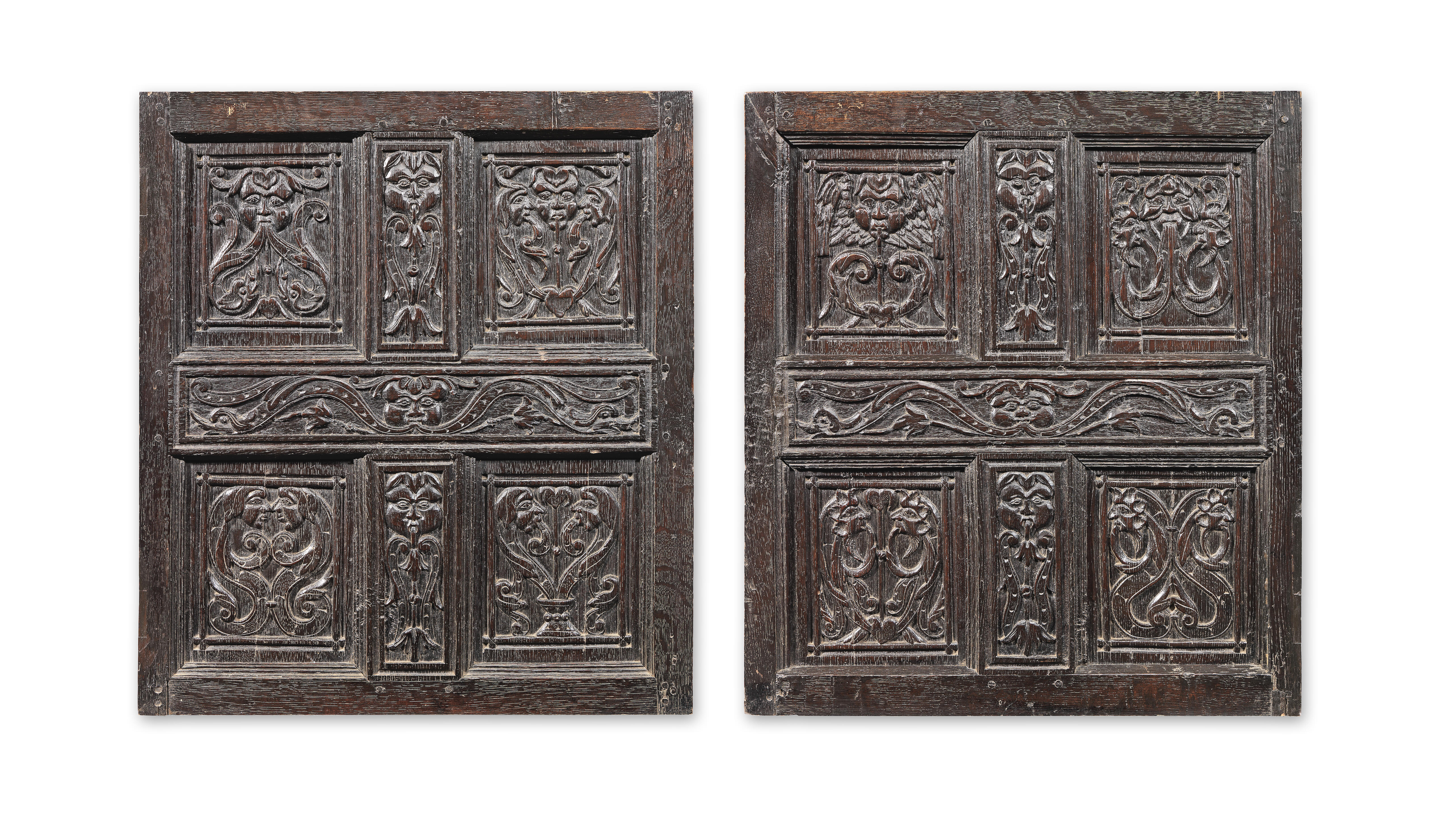 Bonhams : A pair of mid-16th century carved oak panelled doors, Anglo-French, circa 1550 (2)