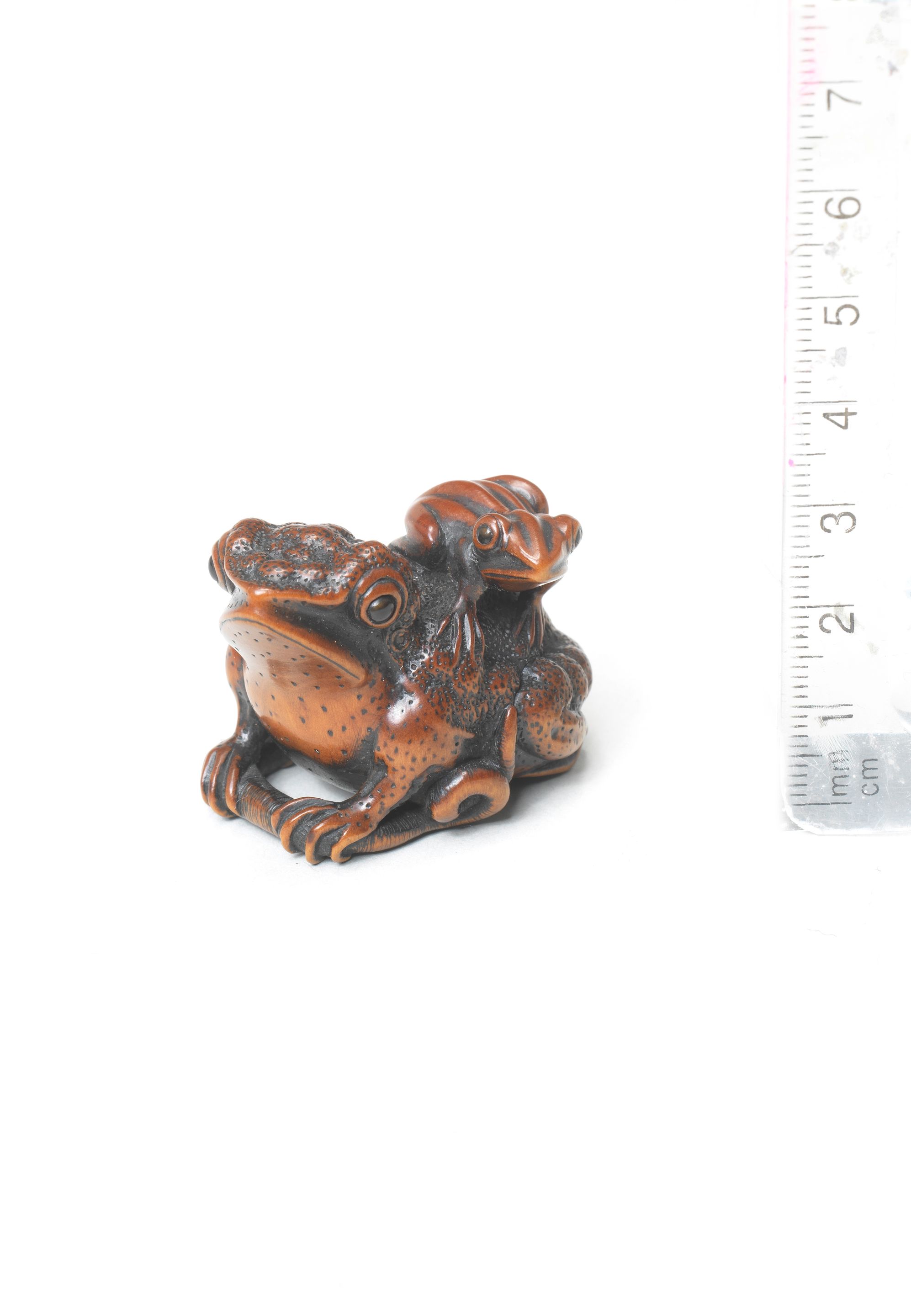 Bonhams : A wood netsuke of a toad and young By Miwa, Edo, early 19th ...