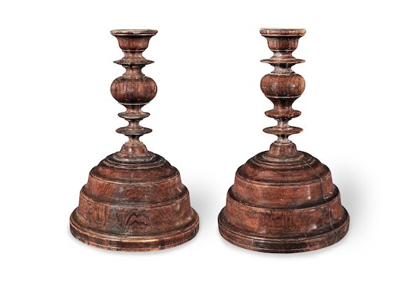Bonhams : A pair of turned lignum vitae candlesticks (2)