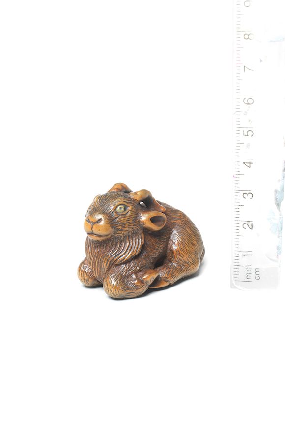 Bonhams : A wood netsuke of a recumbent goat By Tanaka Minko (1735-1816 ...