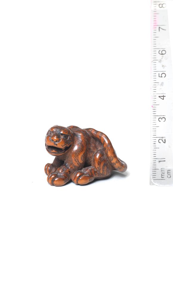 Bonhams : A wood netsuke of a tiger By Kokei, Kuwana, Ise Province ...