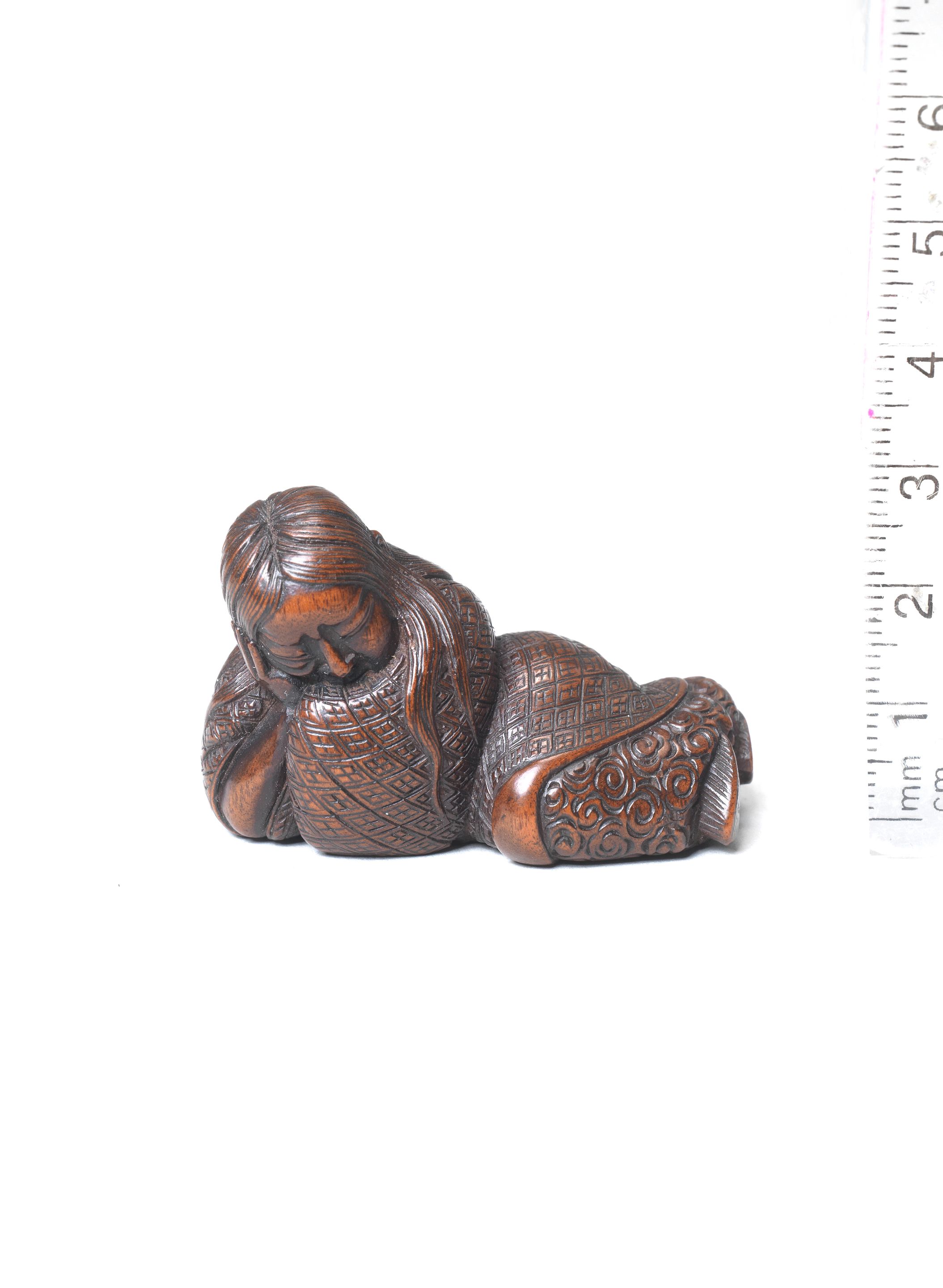 Bonhams : A wood netsuke of a sleeping Shojo By Ikkan (1817-1893 ...